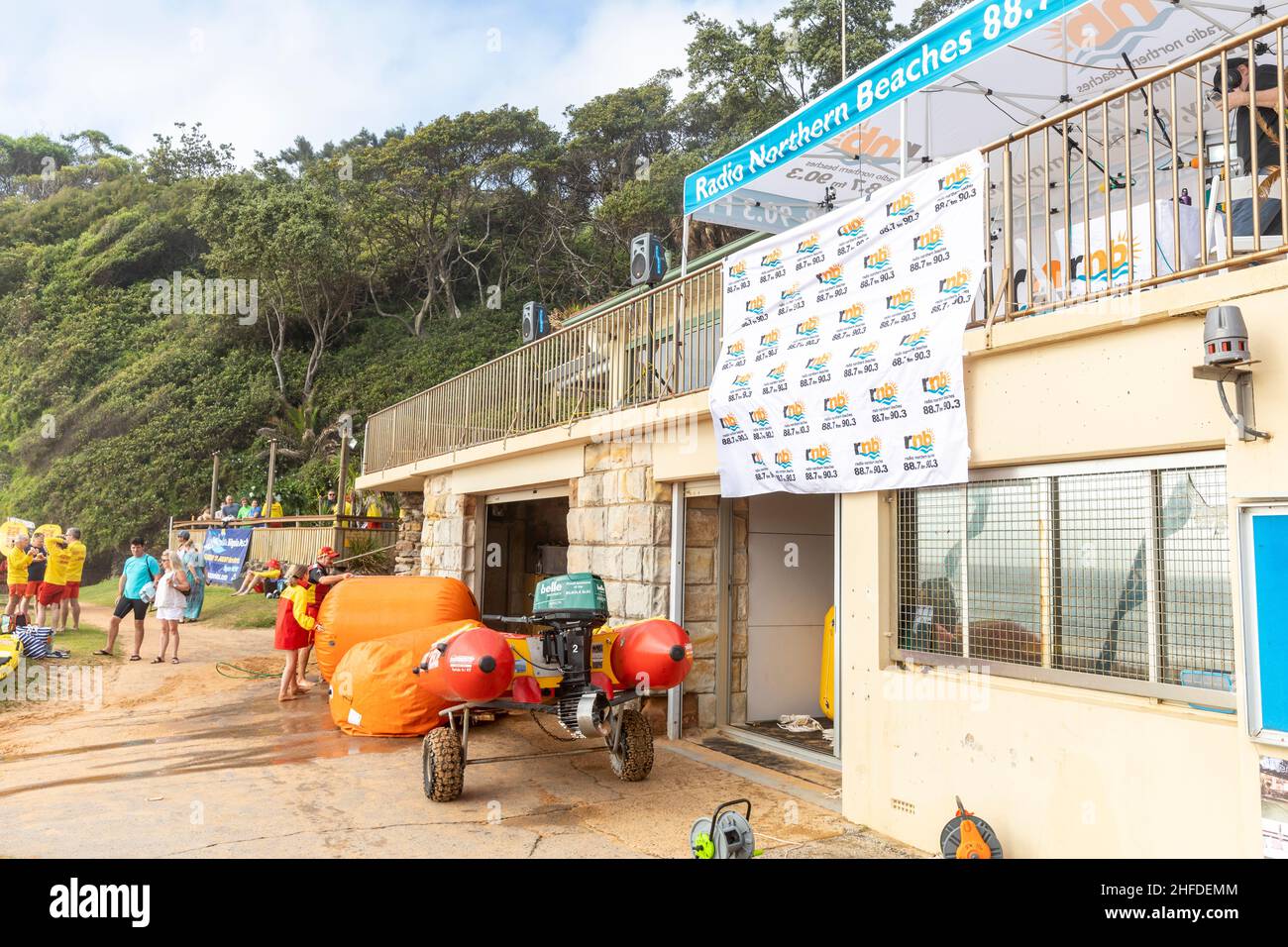 Bilgola Beach Sydney surf life saving club with red zodiac dinghy ...