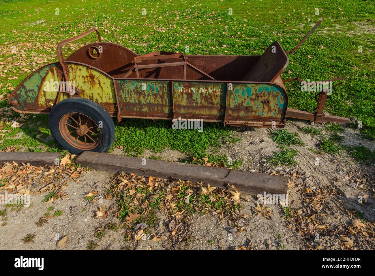 An early john deere farm equipment Stock Photo - Alamy