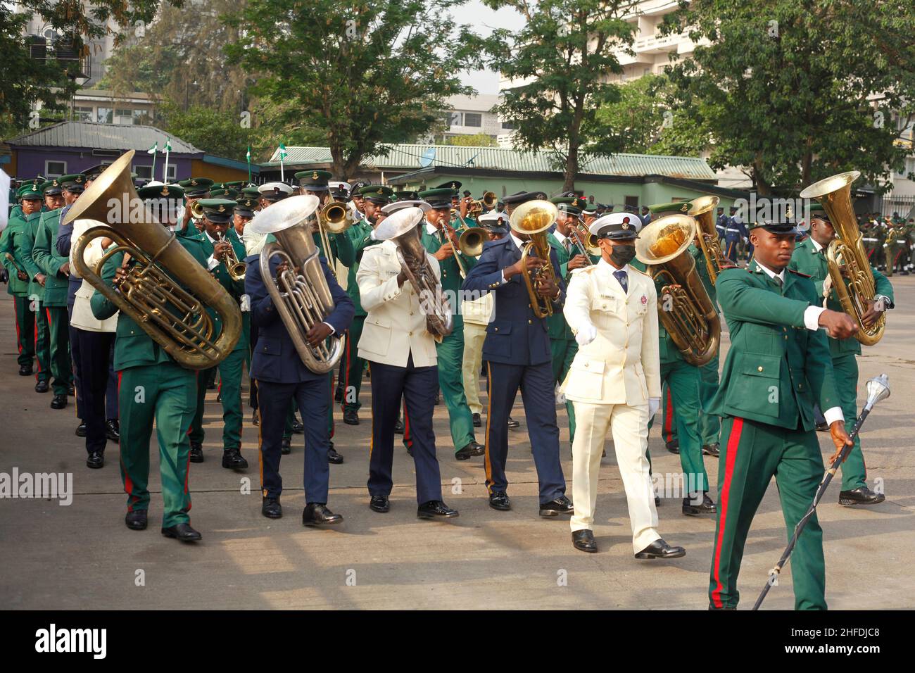Lagos, Nigeria. 15th Jan, 2022. Military personnel march during the parade and laying of wreath ...