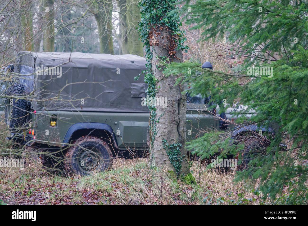 british army land rover defender 110 wolf 4x4 in action on a military ...