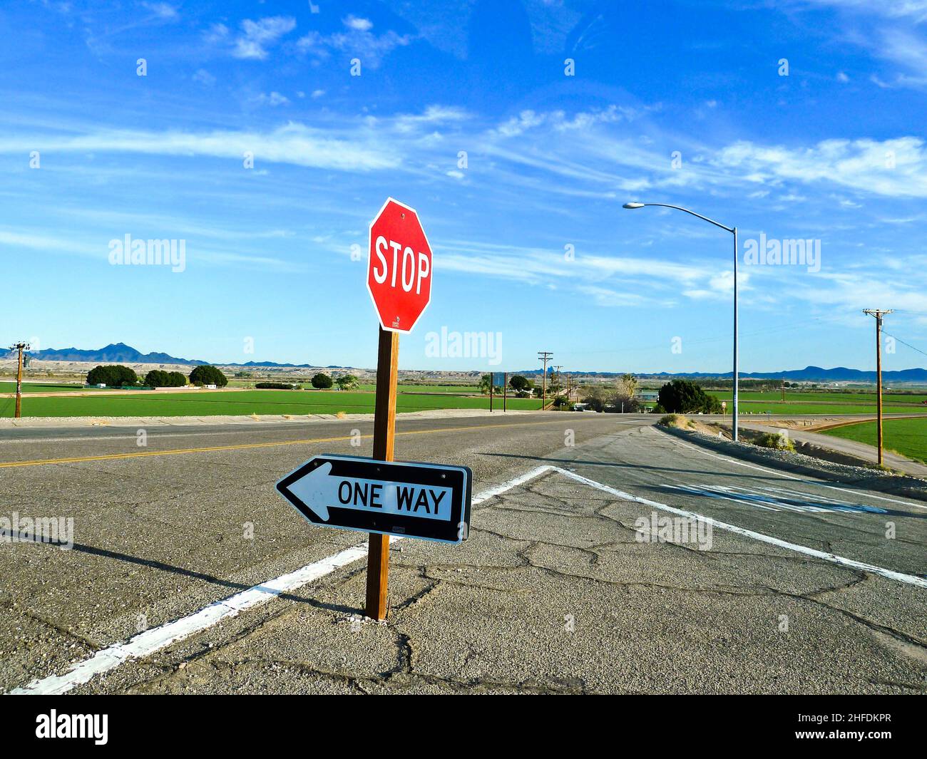traffic sign stop and one way at the street Stock Photo - Alamy