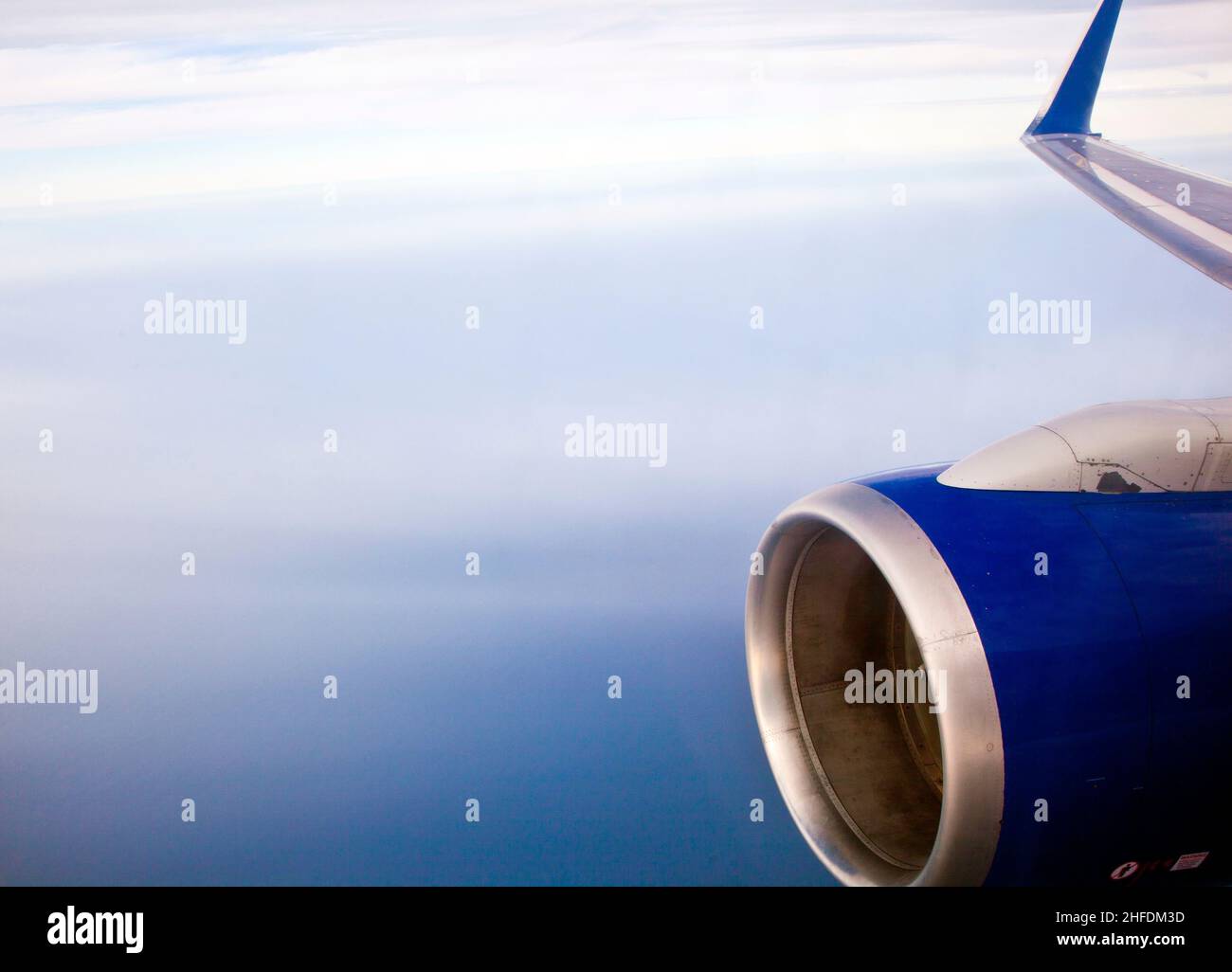 wing of aircraft in sunset Stock Photo - Alamy