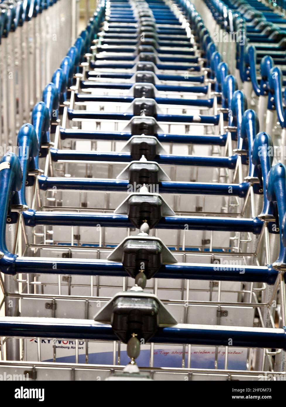 baggage carts in the airport Stock Photo - Alamy