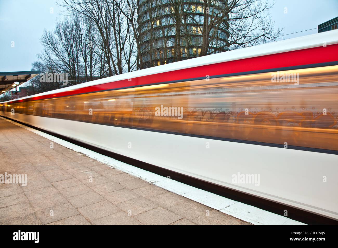 Passenger train leaving station night hi-res stock photography and ...