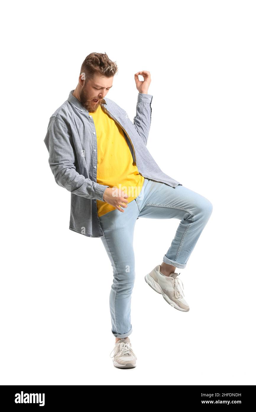 Cool dancing young man isolated on white Stock Photo - Alamy