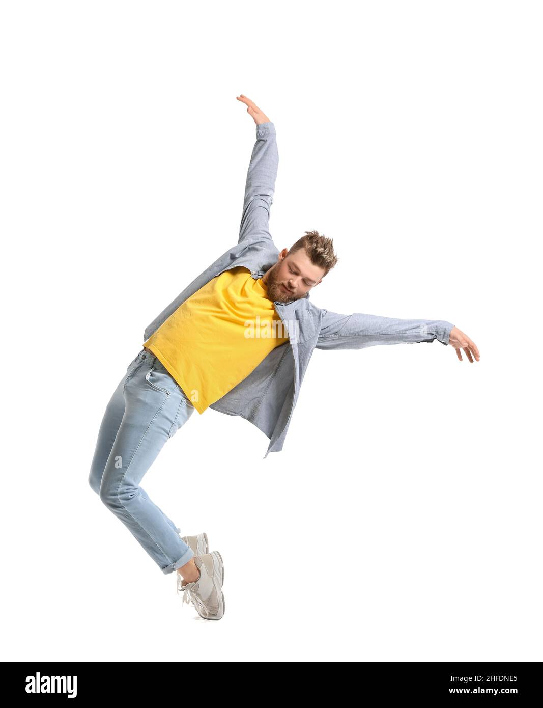 Cool dancing young man isolated on white Stock Photo - Alamy