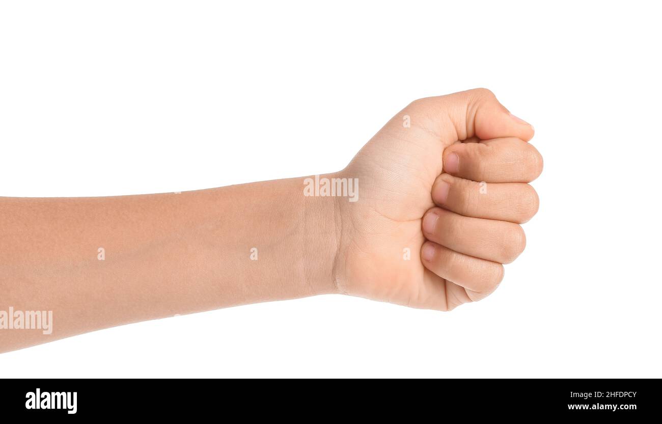 Child with clenched fist on white background Stock Photo - Alamy