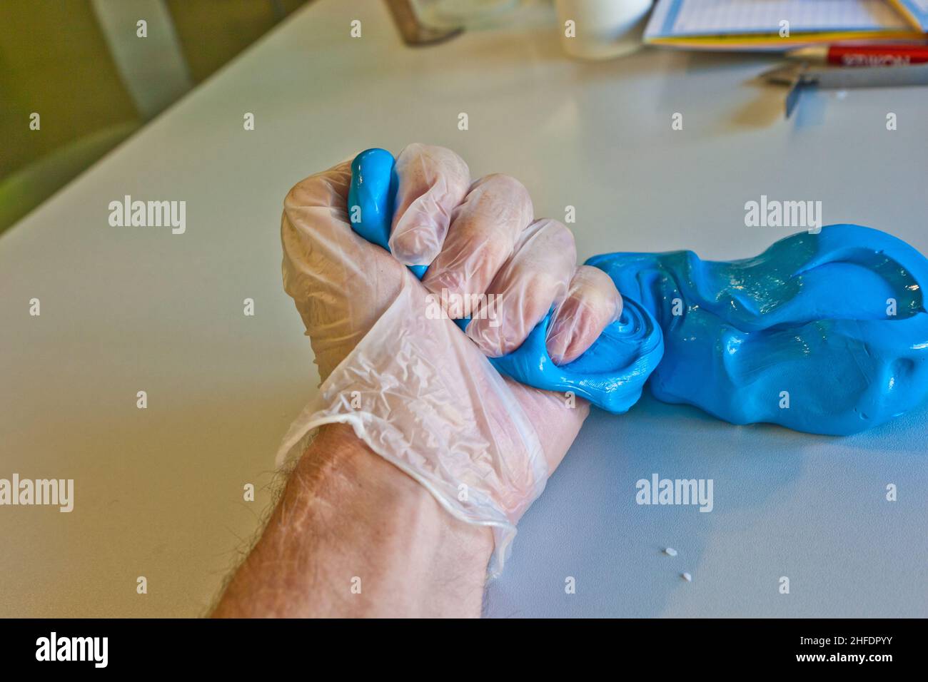 hand physiotherapy to recover a broken finger Stock Photo - Alamy