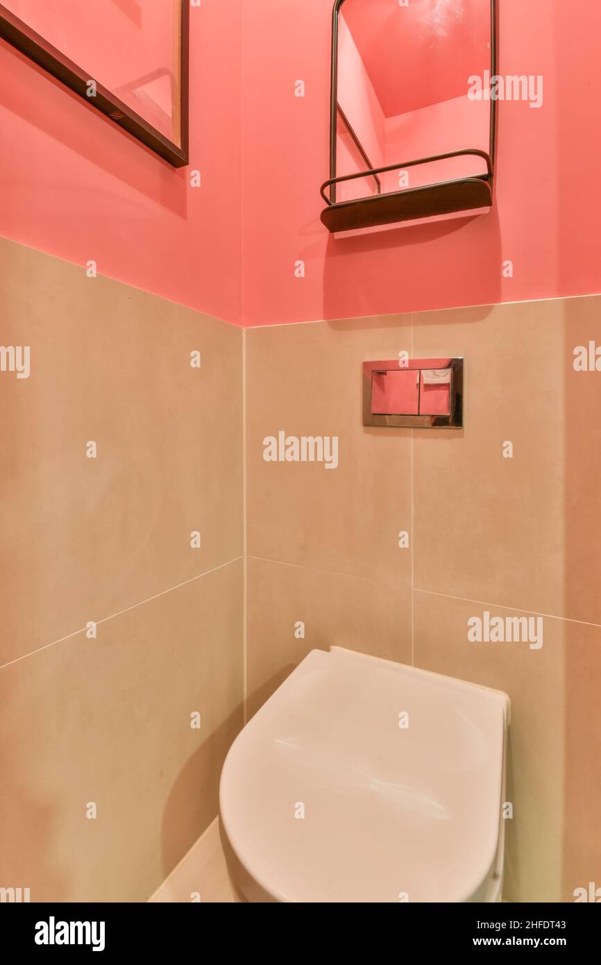 Interior of small clean restroom in miniature style Stock Photo - Alamy