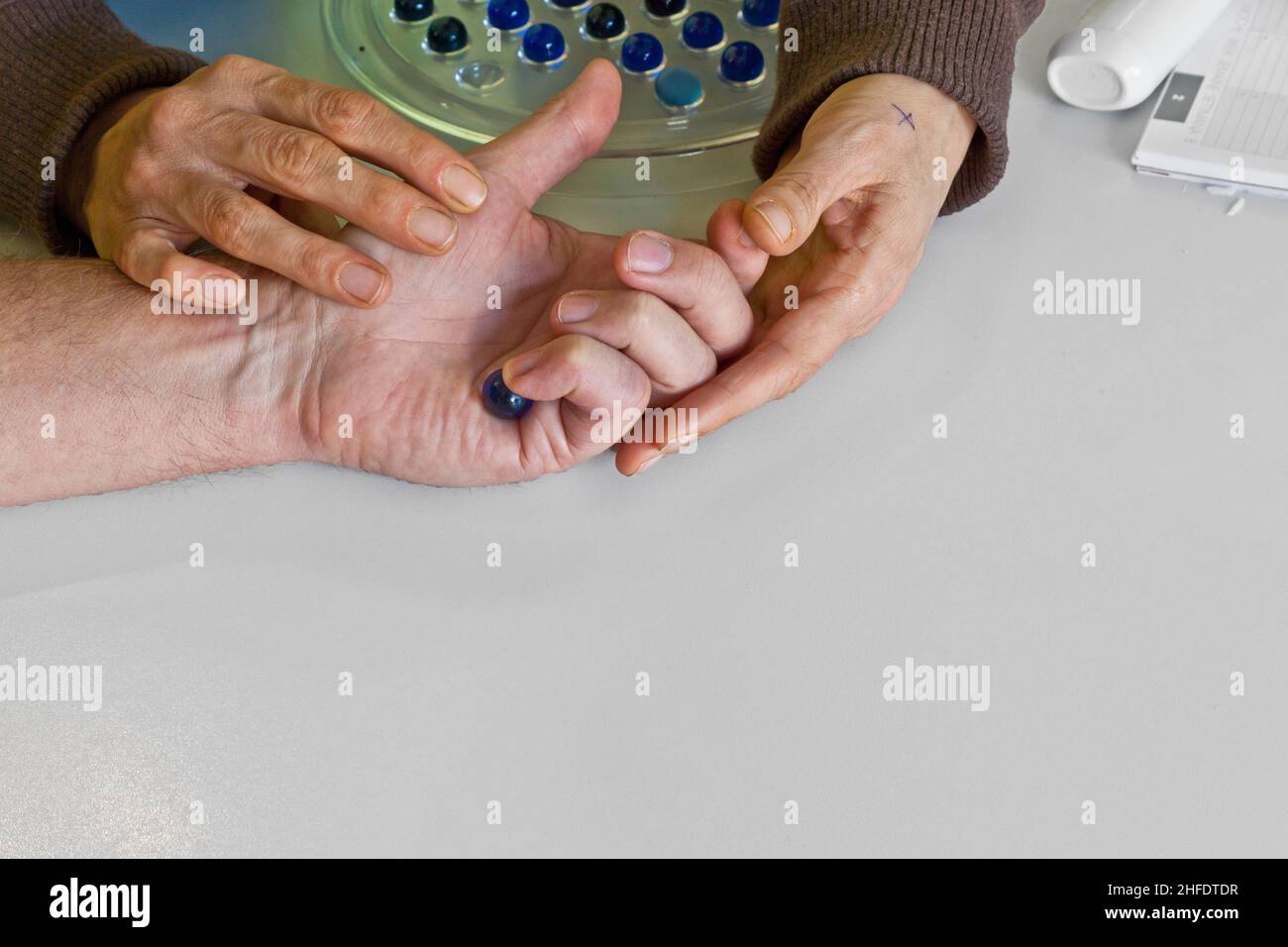 hand physiotherapy to recover a broken finger Stock Photo - Alamy