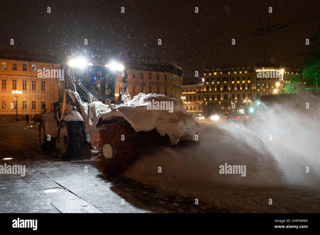 Snow Plow clearing road at night, municipal services cleaning city ... Snow Plow clearing road at night, municipal services cleaning city ...