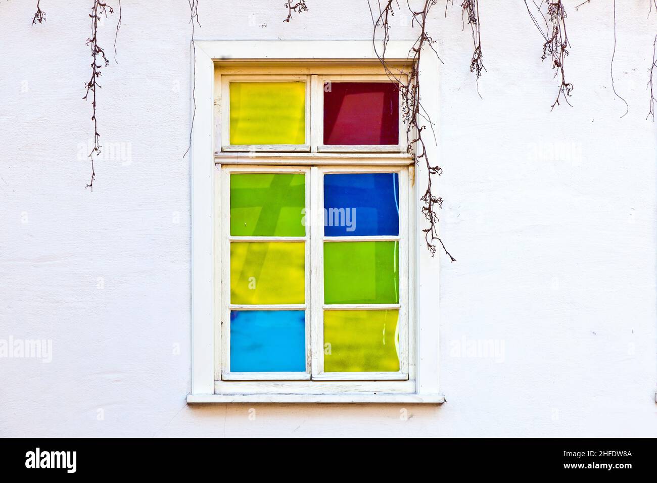 old colorful window with white wall Stock Photo - Alamy