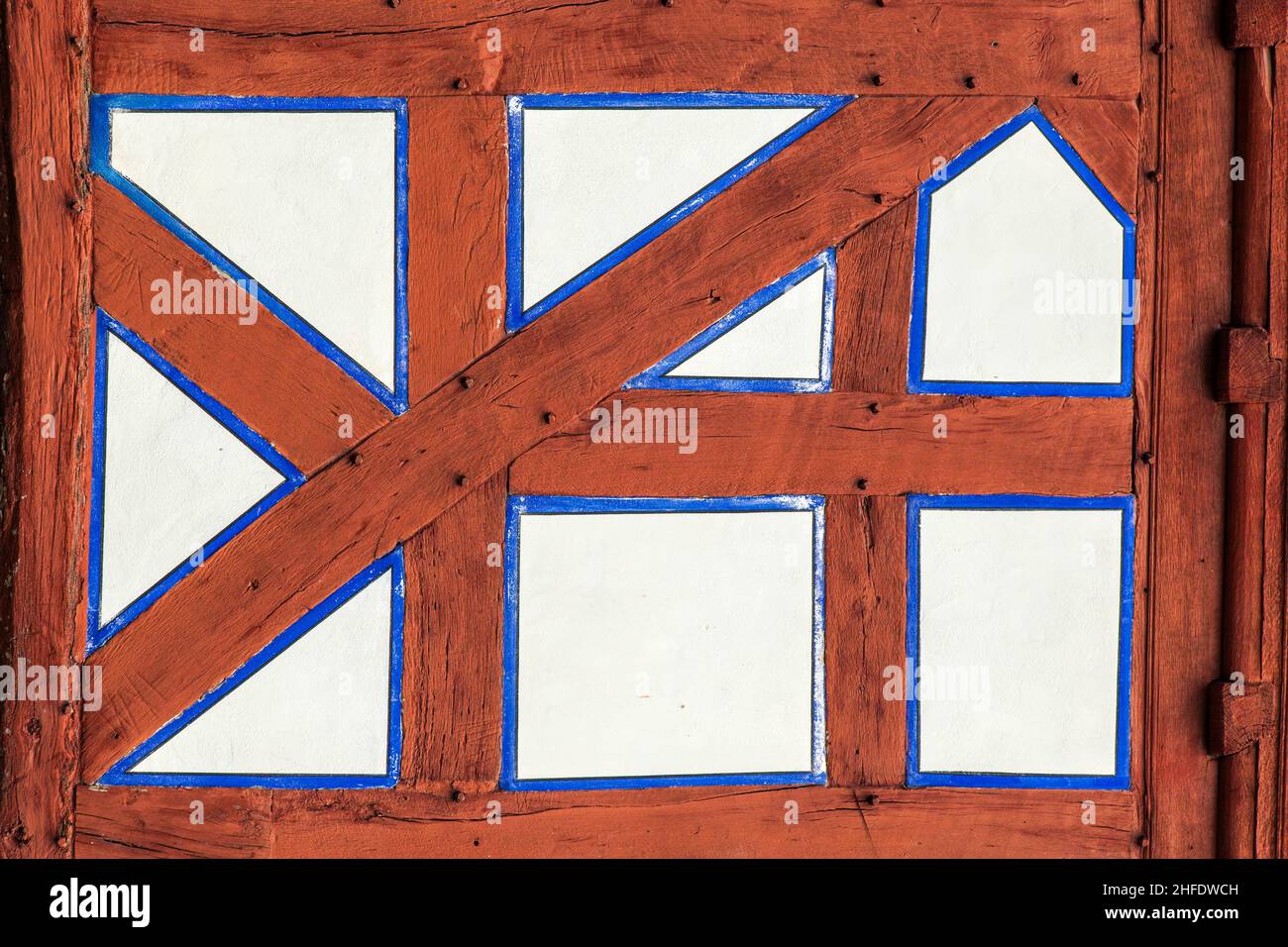 detail of old historic frame house in red and blue Stock Photo - Alamy