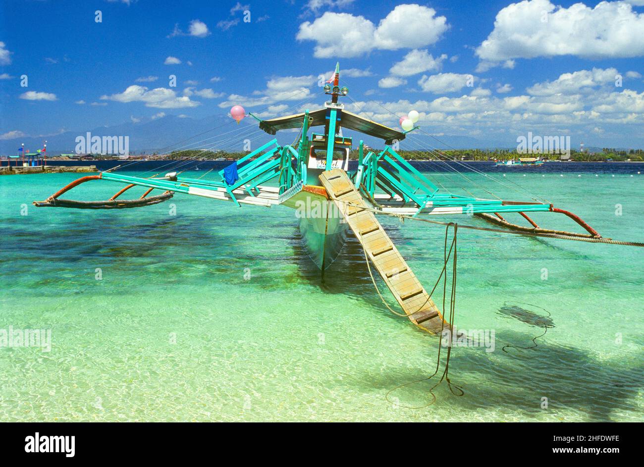 Traditional Filipino outrigger fishing boats - known as 'bangka' boats ...