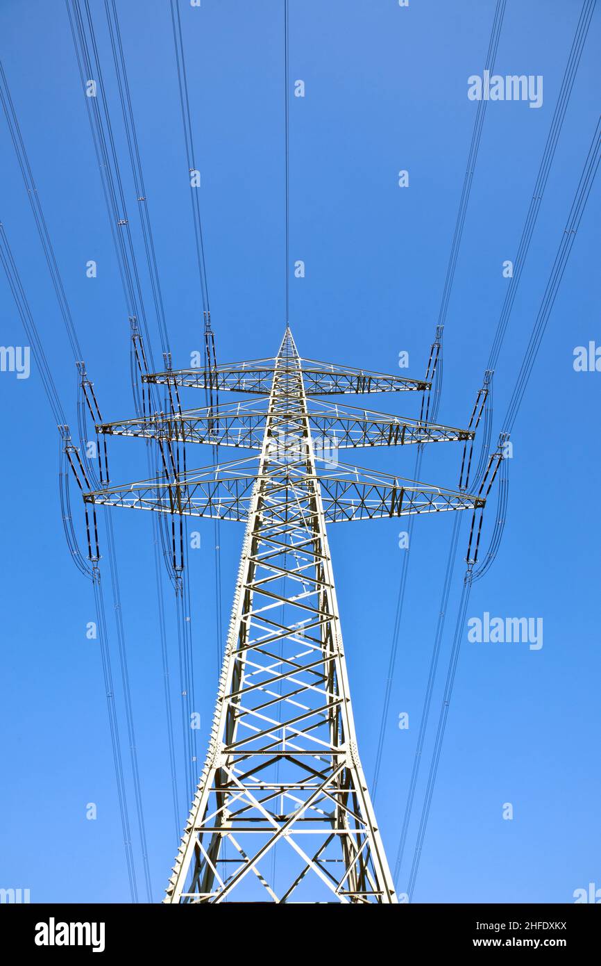 electrical pylon under blue sky, power line cable Stock Photo - Alamy