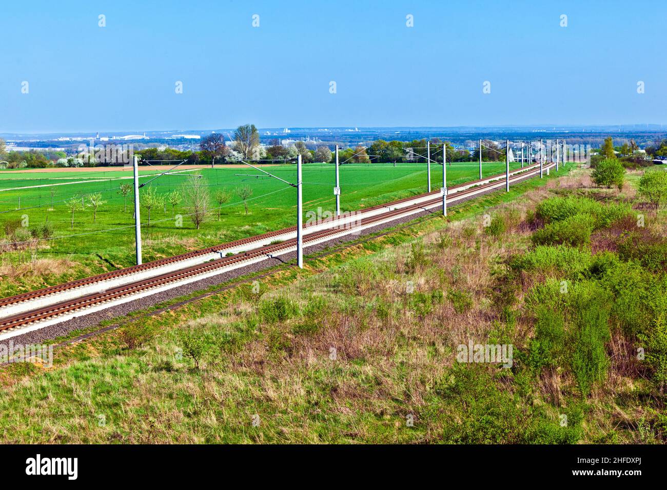 high speed train with full speed in landscape Stock Photo - Alamy