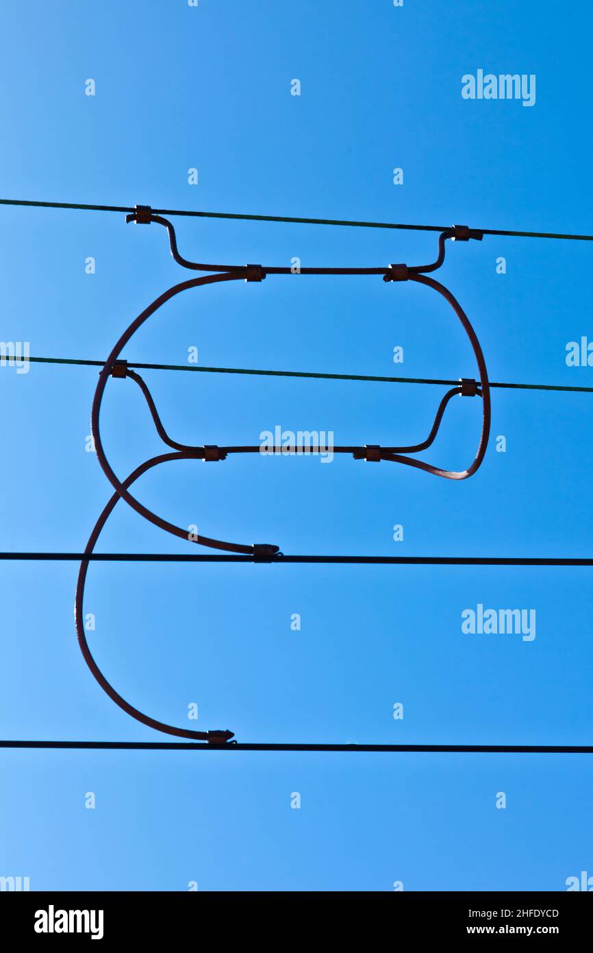 Overhead contact wires Stock Photo - Alamy