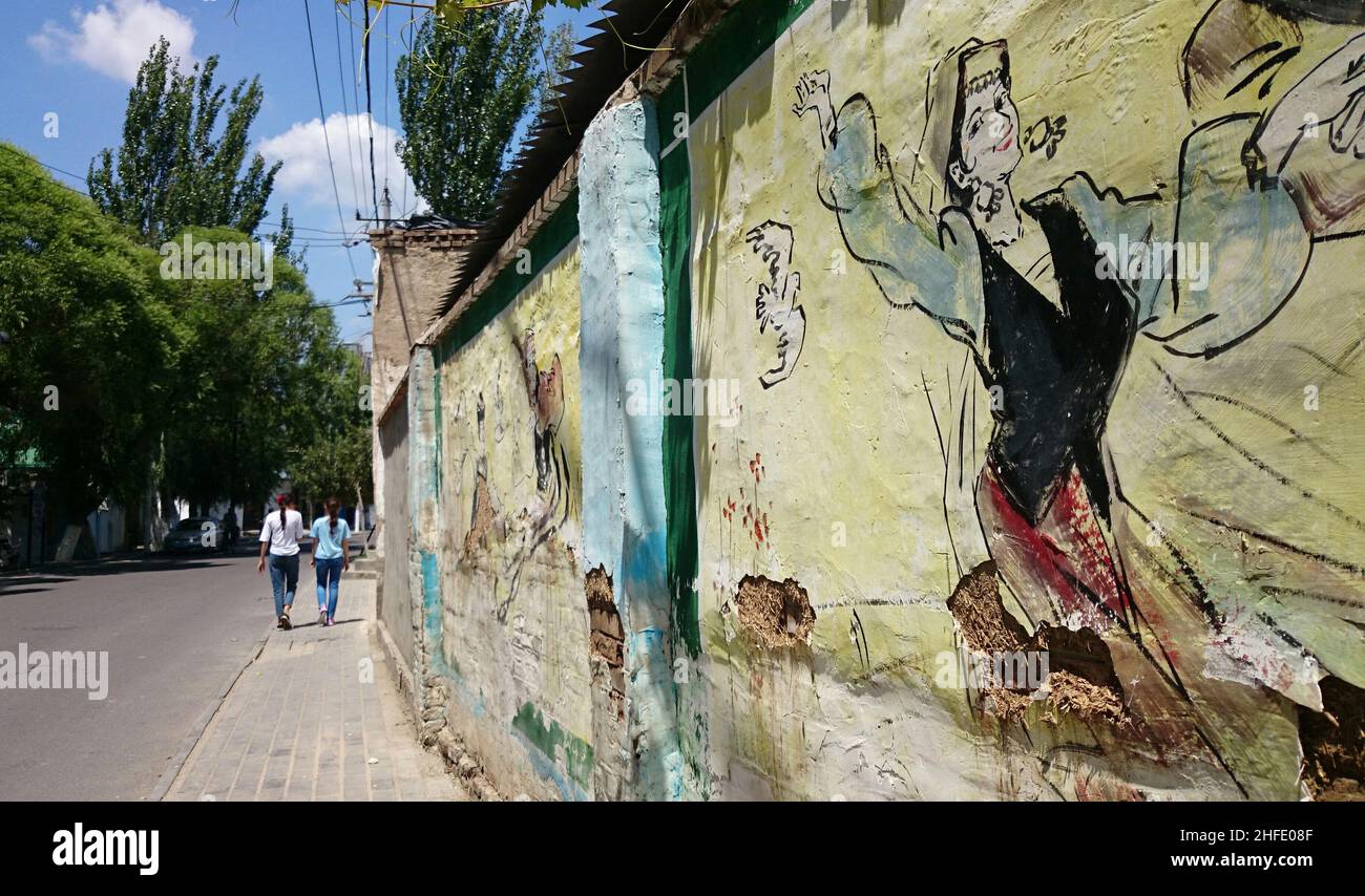 Ethnic characteristic murals on the civil house Stock Photo - Alamy
