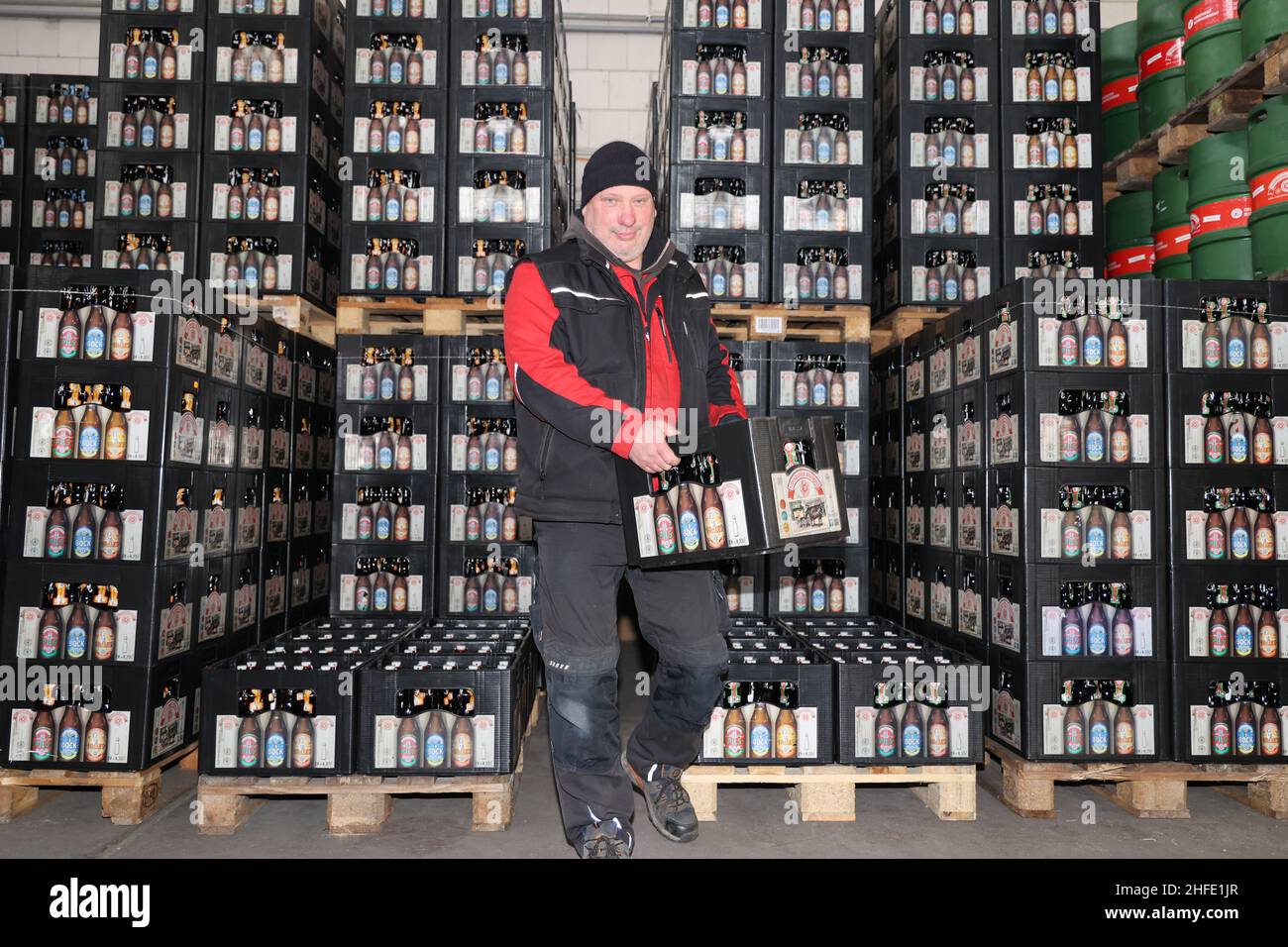 13 January 2022, Saxony-Anhalt, Magdeburg: Brewery employee Dennis ...