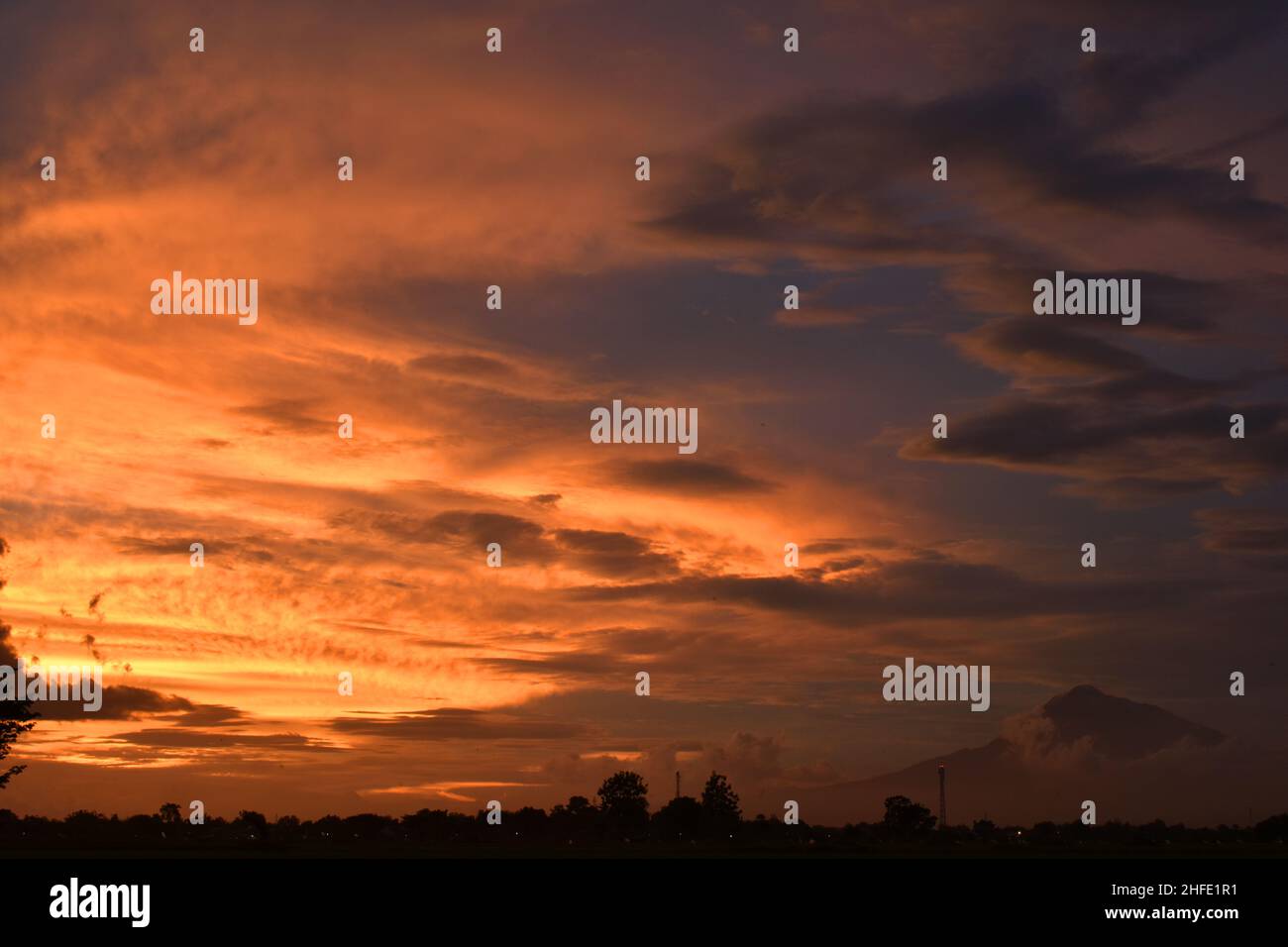 sunset near mount merapi, java, indonesia Stock Photo - Alamy