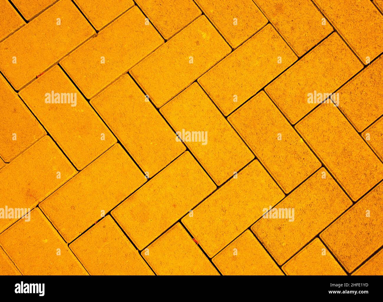 pavement pattern made with cast concrete blocks in yellow color Stock ...