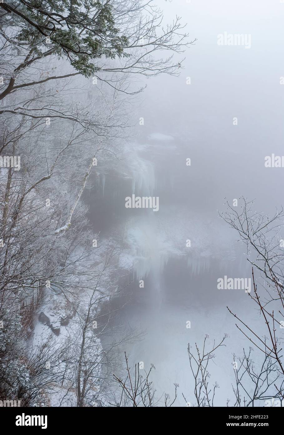 The upper drop of Kaaterskill Falls. Winter landscape with fresh snow ...