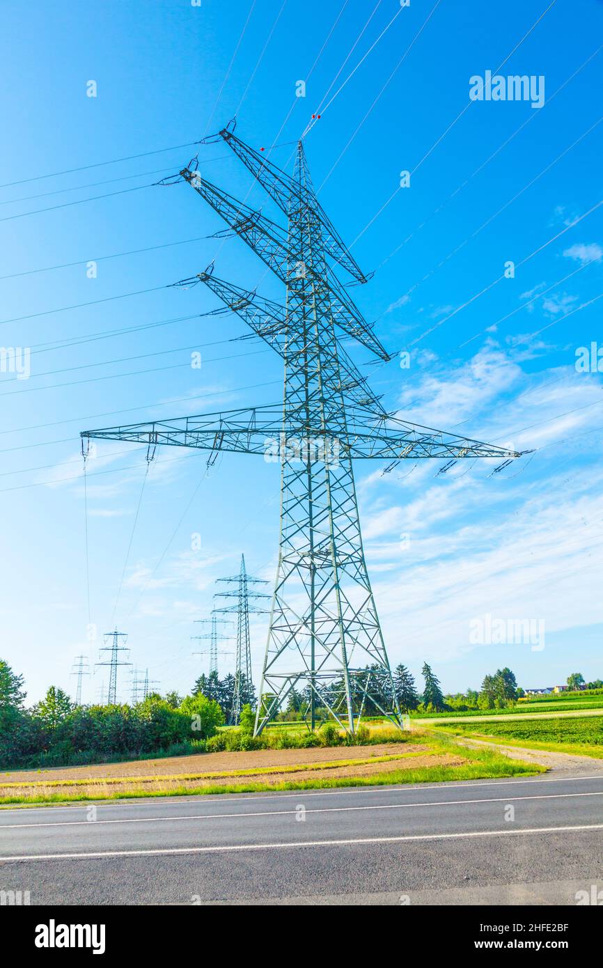 electrical tower in landscape with street Stock Photo - Alamy