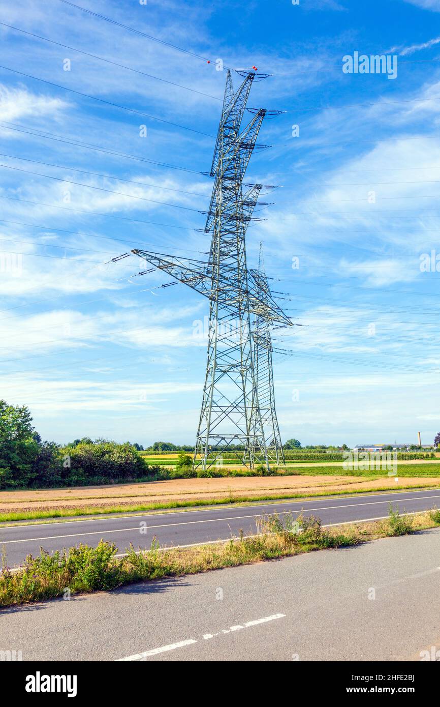 electrical tower in landscape with street Stock Photo - Alamy
