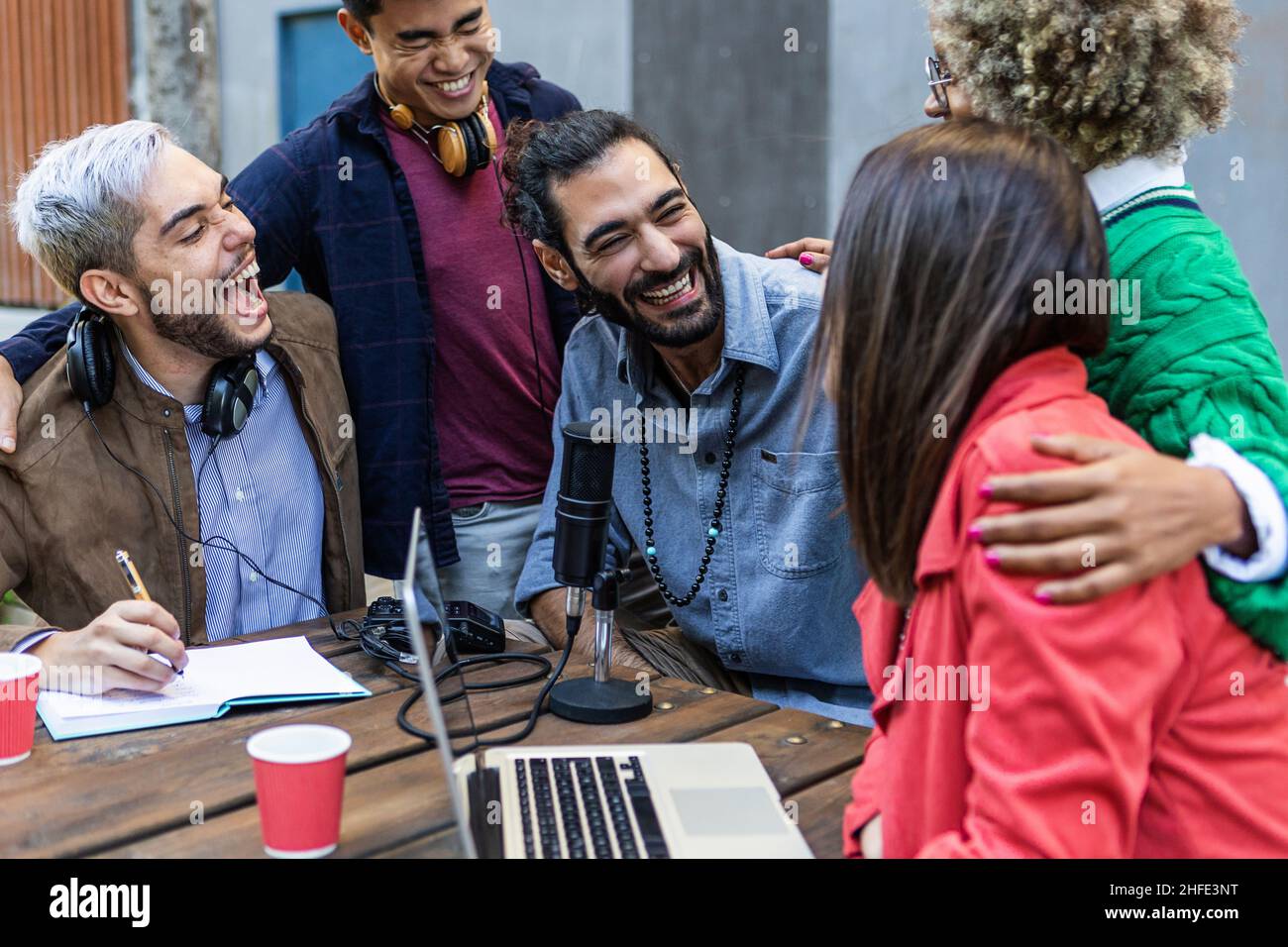Group of five college students friends studying on campus at university ...