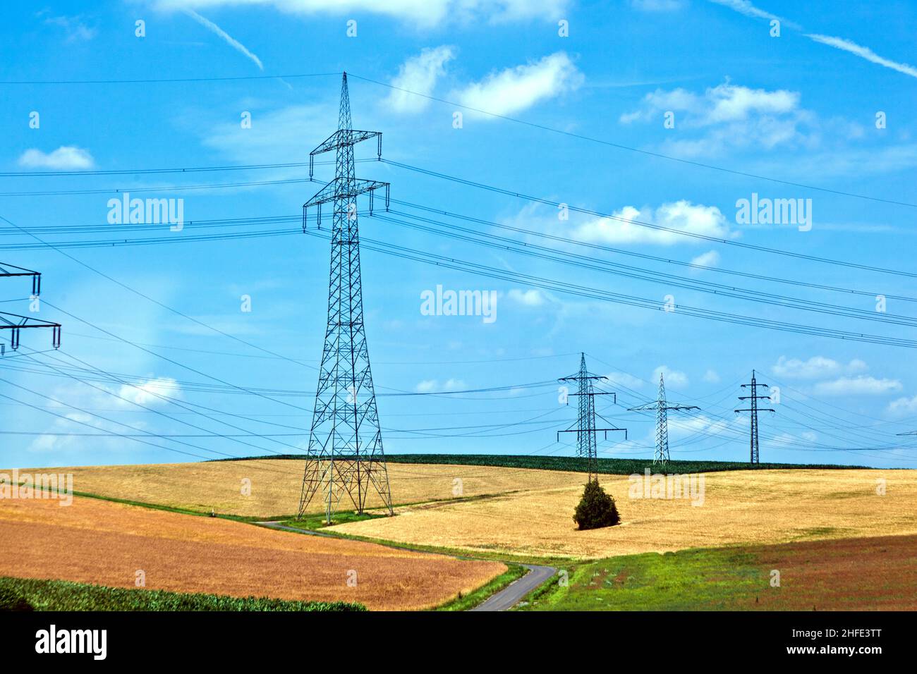 electrical power line with wind generator in rural landscape Stock ...
