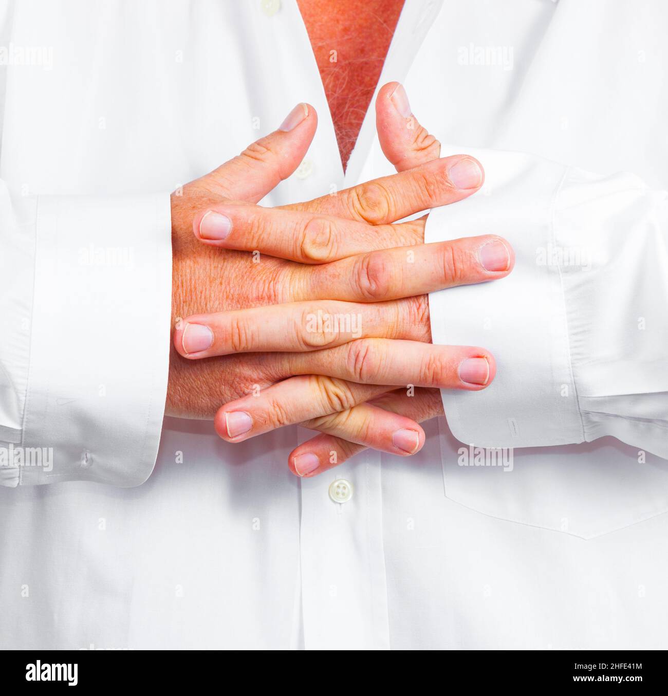 detail of folded hands of a man Stock Photo - Alamy
