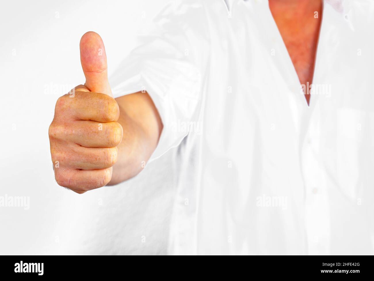 Hand gesturing the all right symbol Stock Photo - Alamy