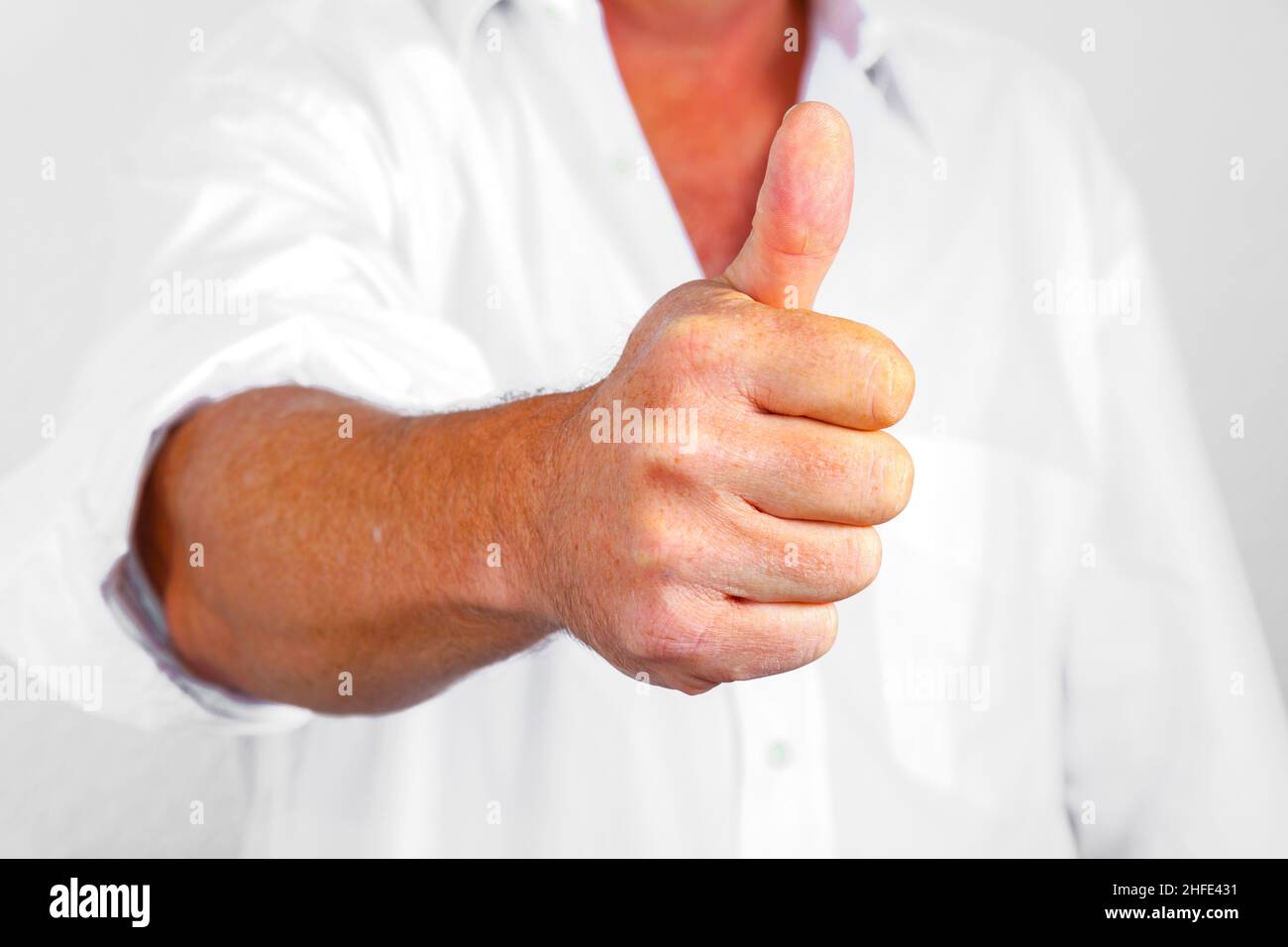 Hand gesturing the all right symbol Stock Photo - Alamy