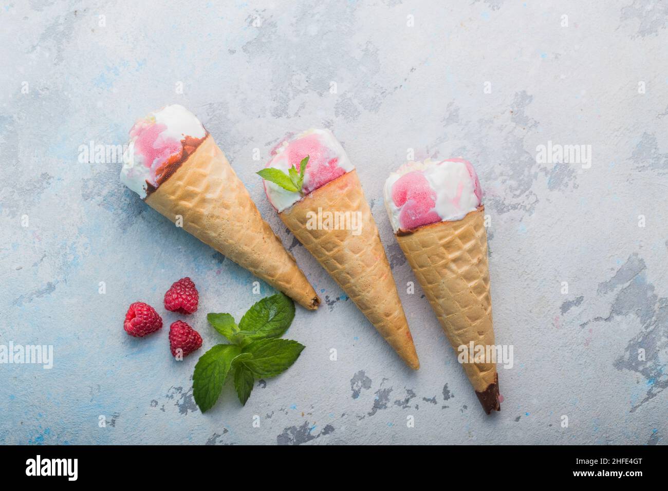 flavors of ice cream scoops stack on a cone Stock Photo - Alamy