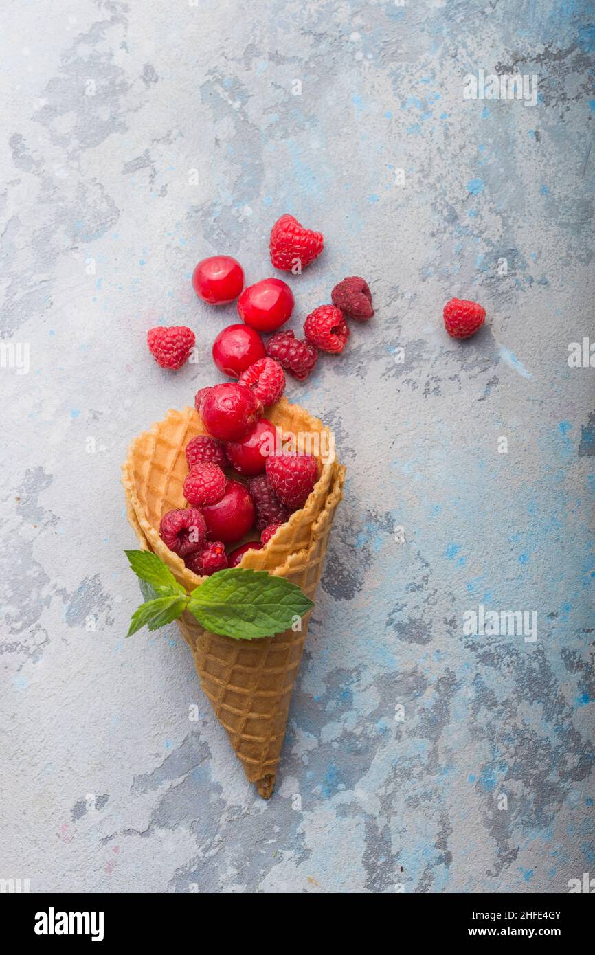 flavors of ice cream scoops stack on a cone Stock Photo - Alamy