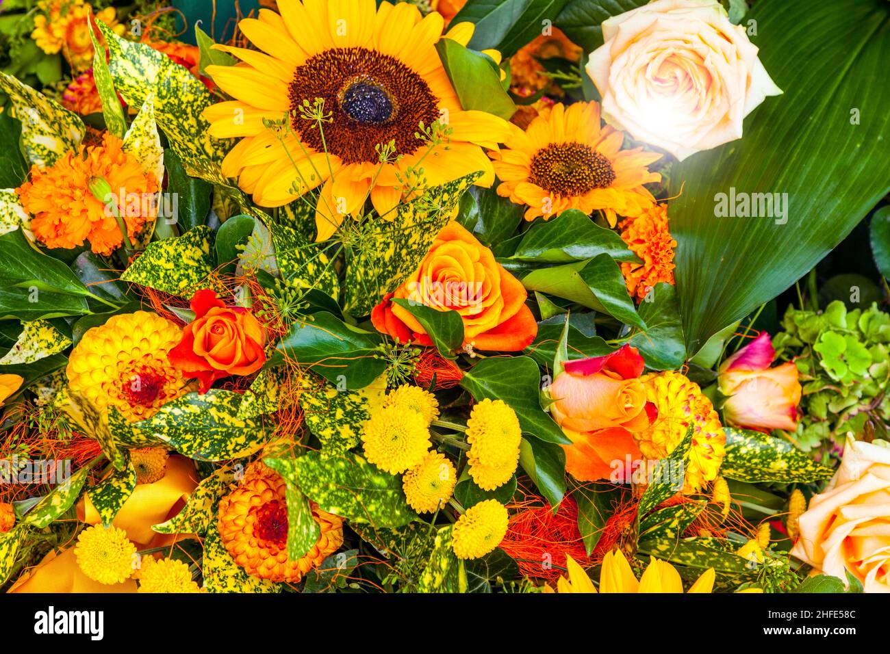 flowers at the grave with sentence in love Stock Photo - Alamy