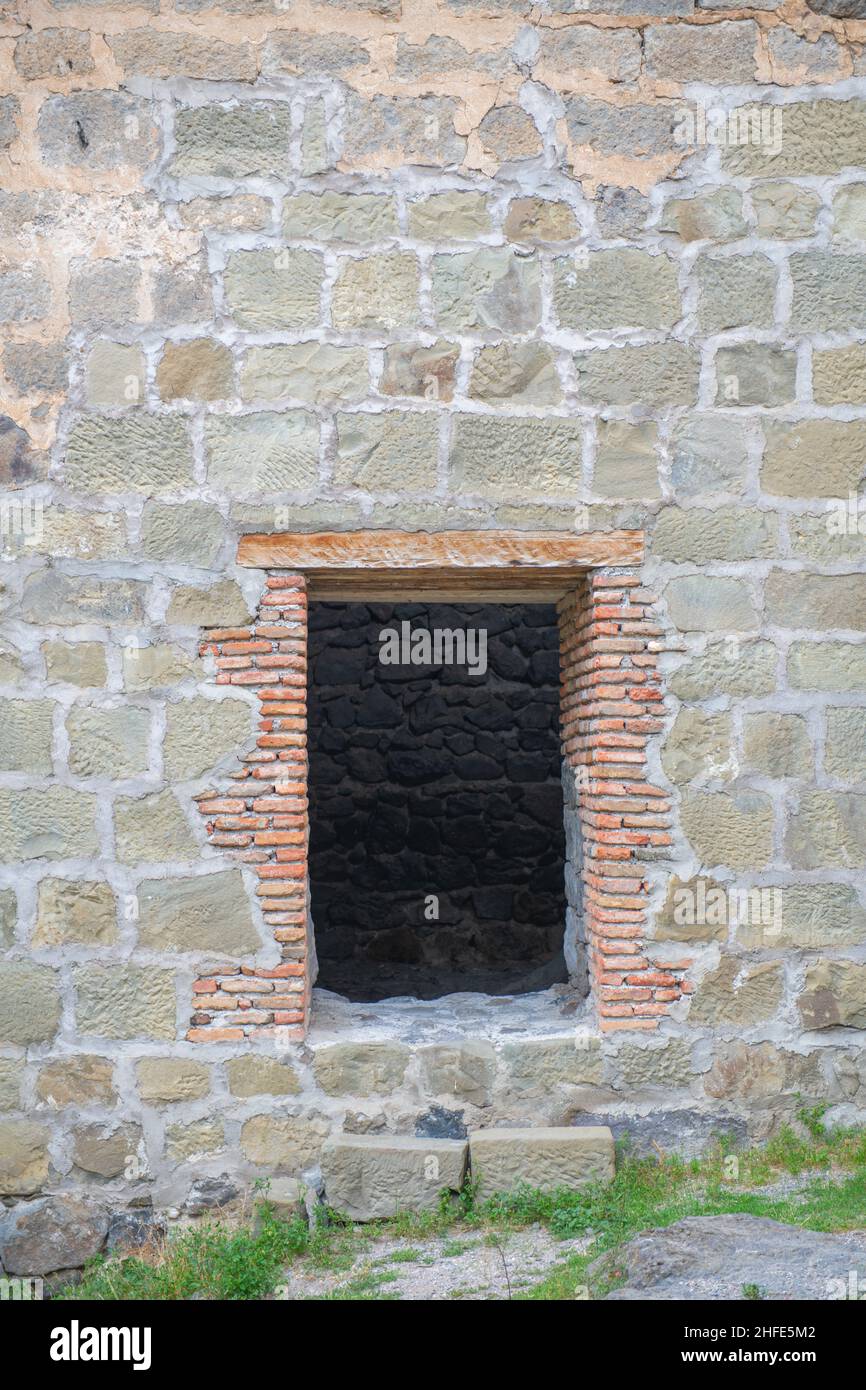 small rectangular window in the fortress wall Stock Photo - Alamy
