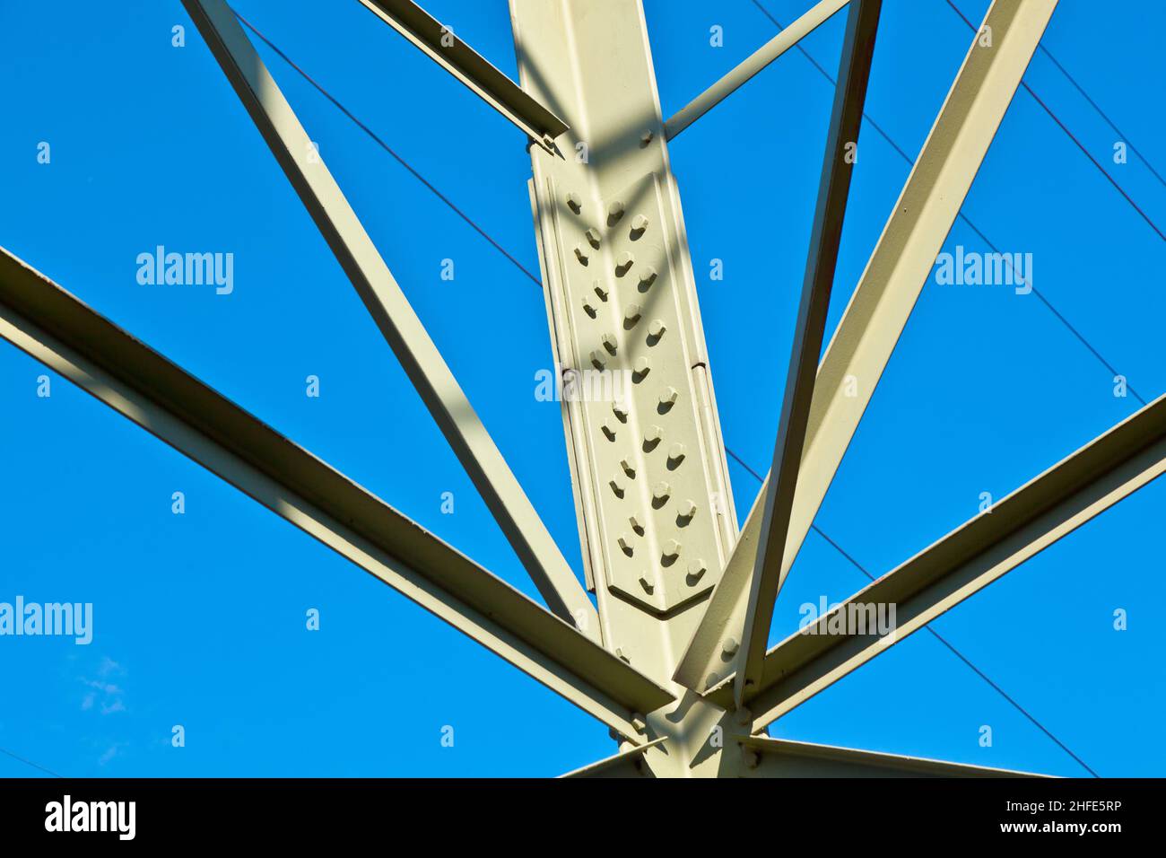 electrical pylon under blue sky, power line cable Stock Photo - Alamy