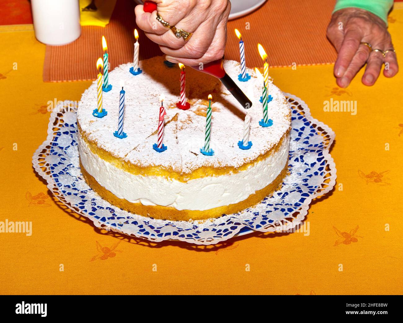 White chocolate frosted happy birthday cake candles hi-res stock ...