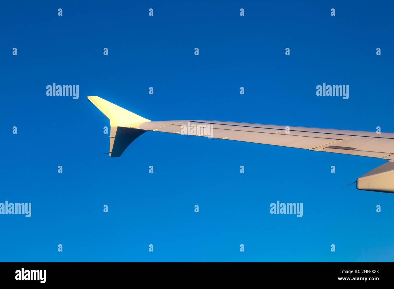 wing of aircraft in the sky Stock Photo - Alamy