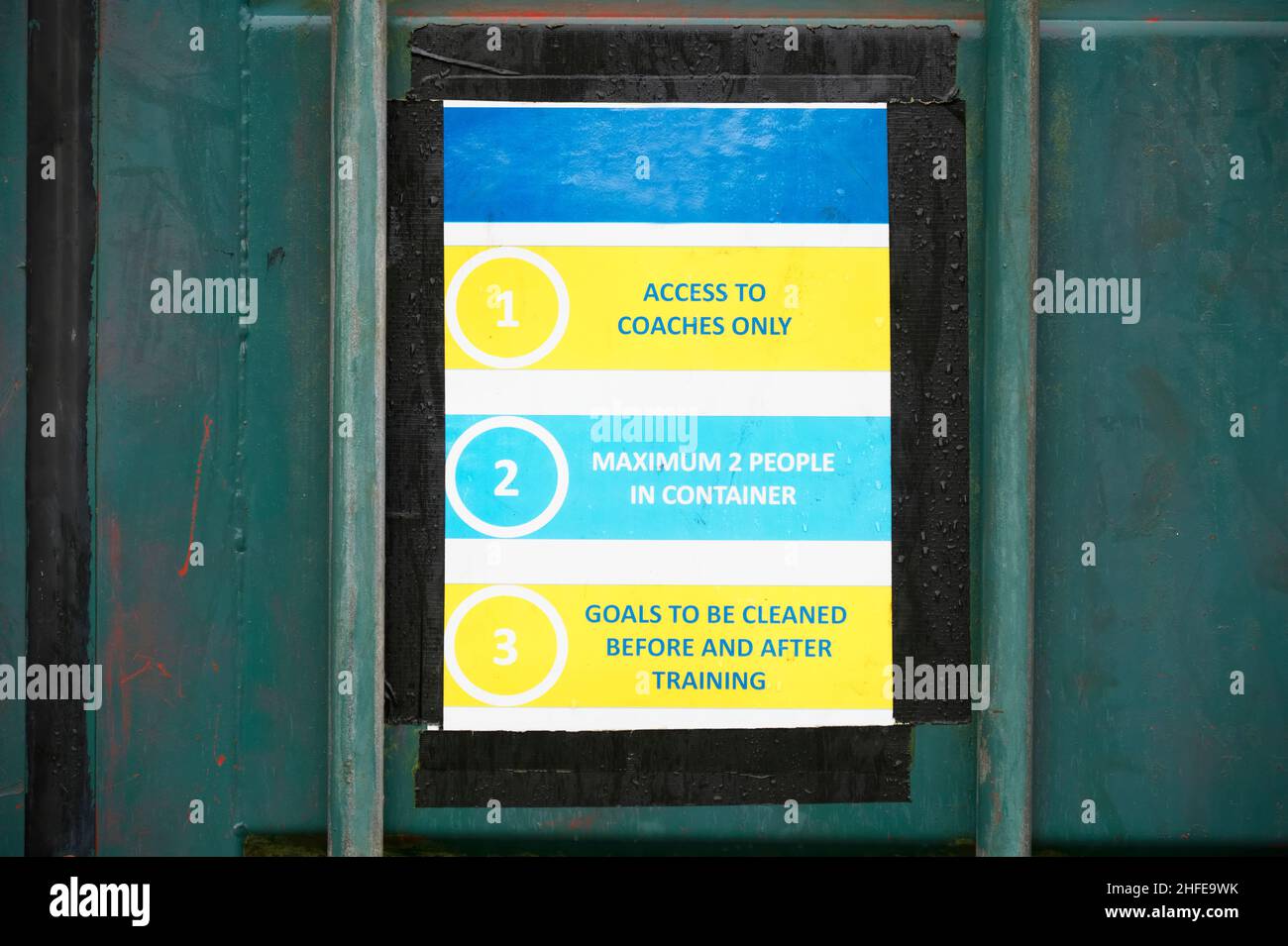 Sport club access gate Covid-19 health and safety sign Stock Photo - Alamy