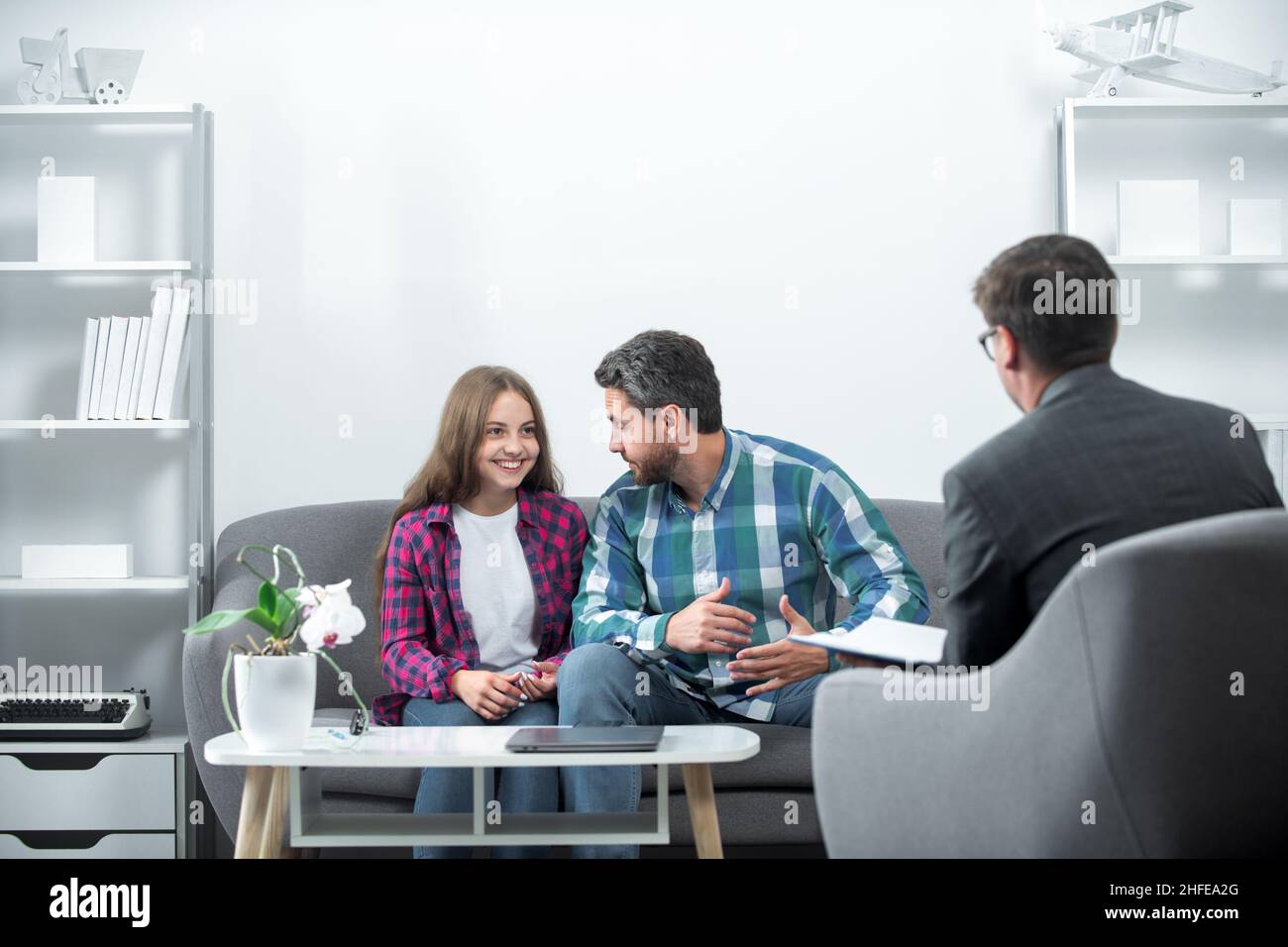 Father and child daughter with girl discussing problems in family with ...