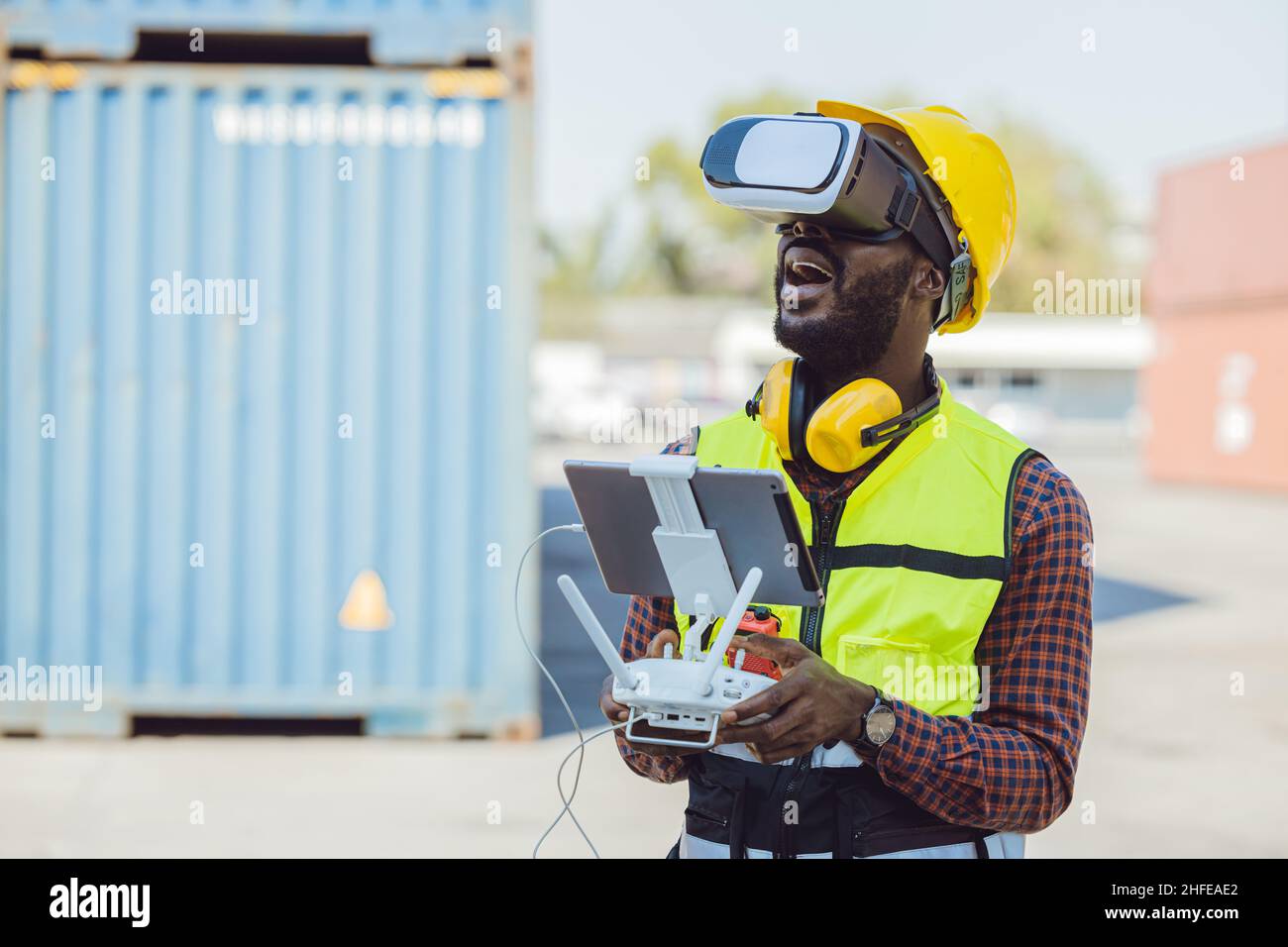 engineer staff worker using modern technology drone and VR headset for ...