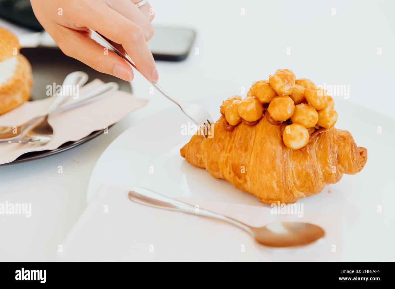 Croissant with Macadamia topping luxury bakery looking tasty delicious ...