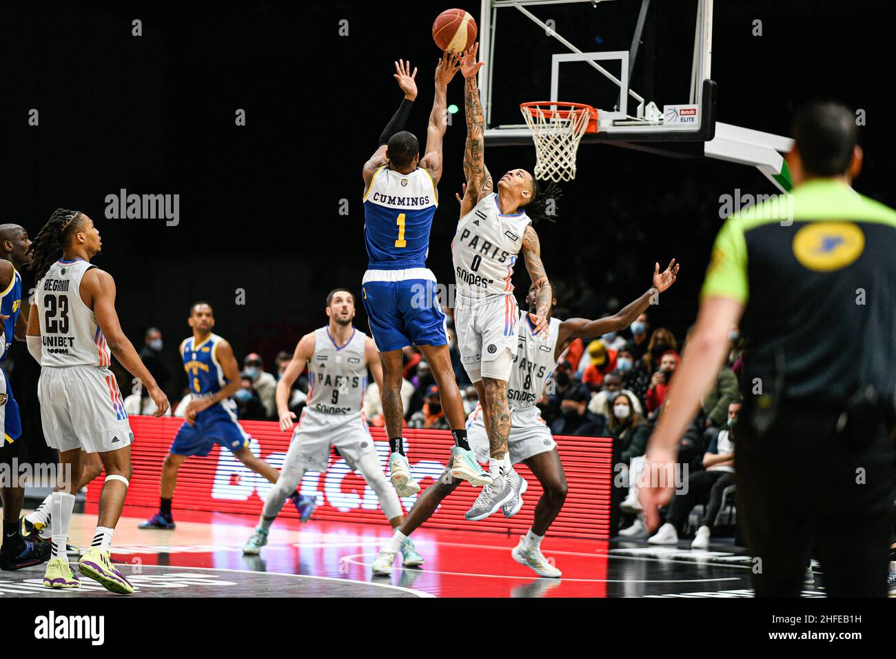 Kyle Allman Jr. (right) of Paris Basketball blocks Will Cummings of ...