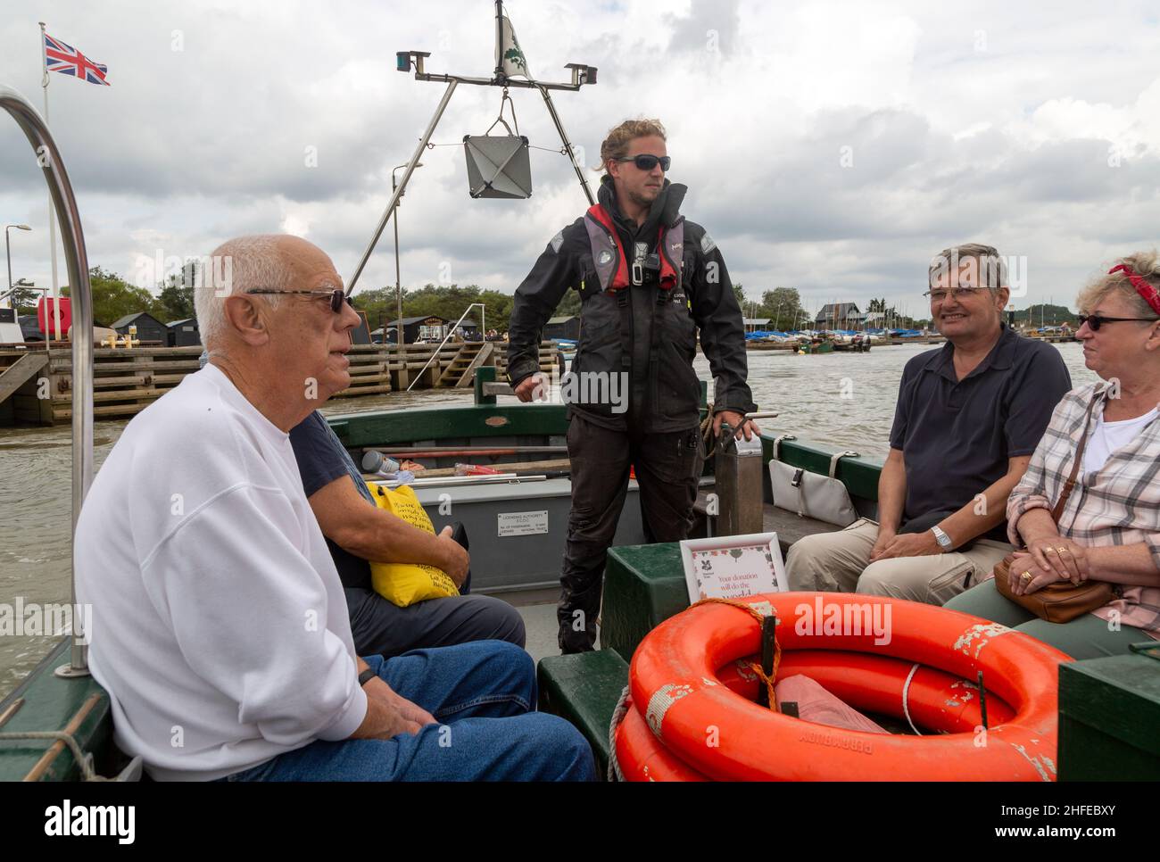 Small ferry boat taking visitors from Orford to Orford Ness, Suffolk ...