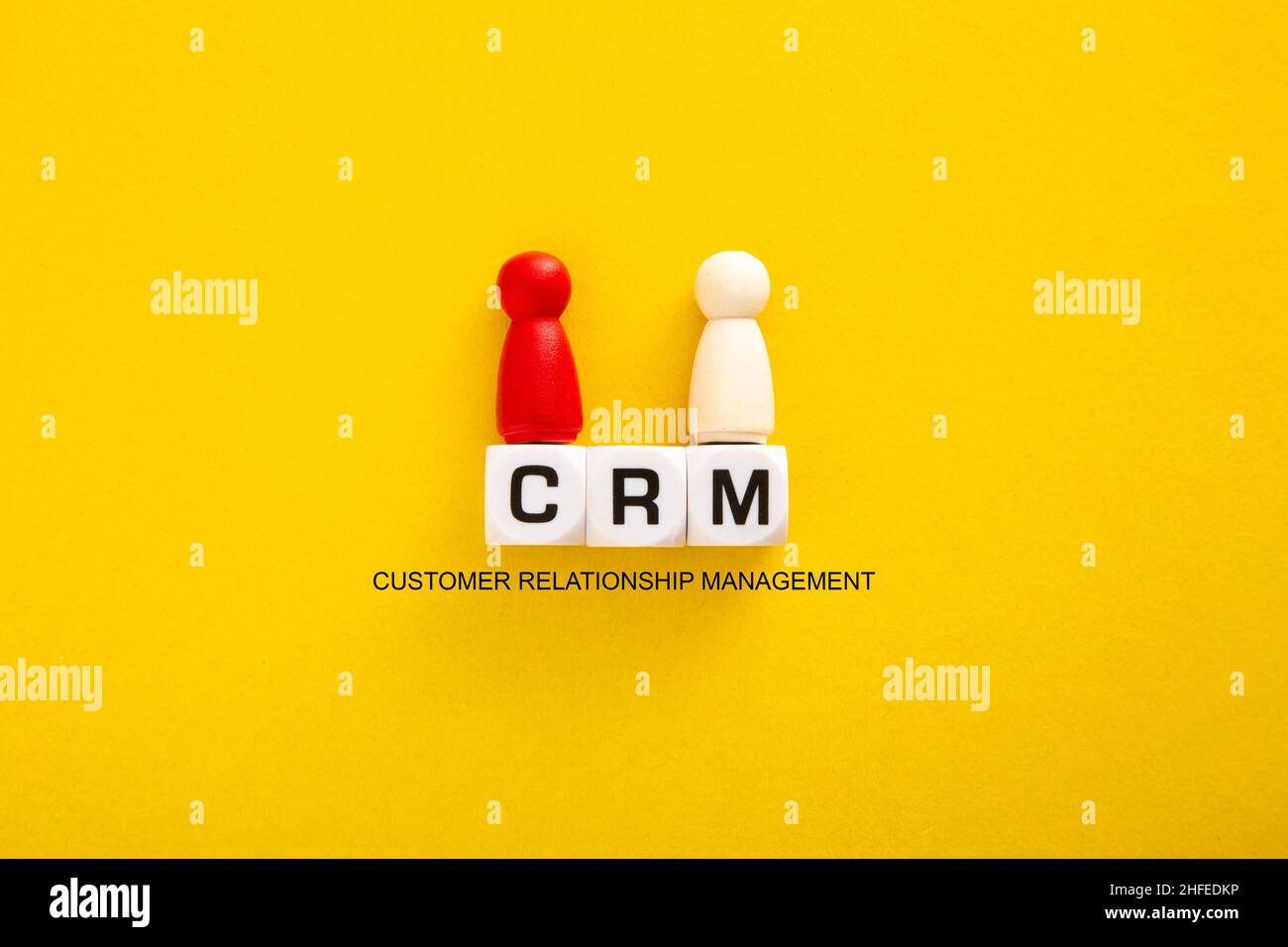Customer Relationship Management (CRM). Block Letters on Yellow ...