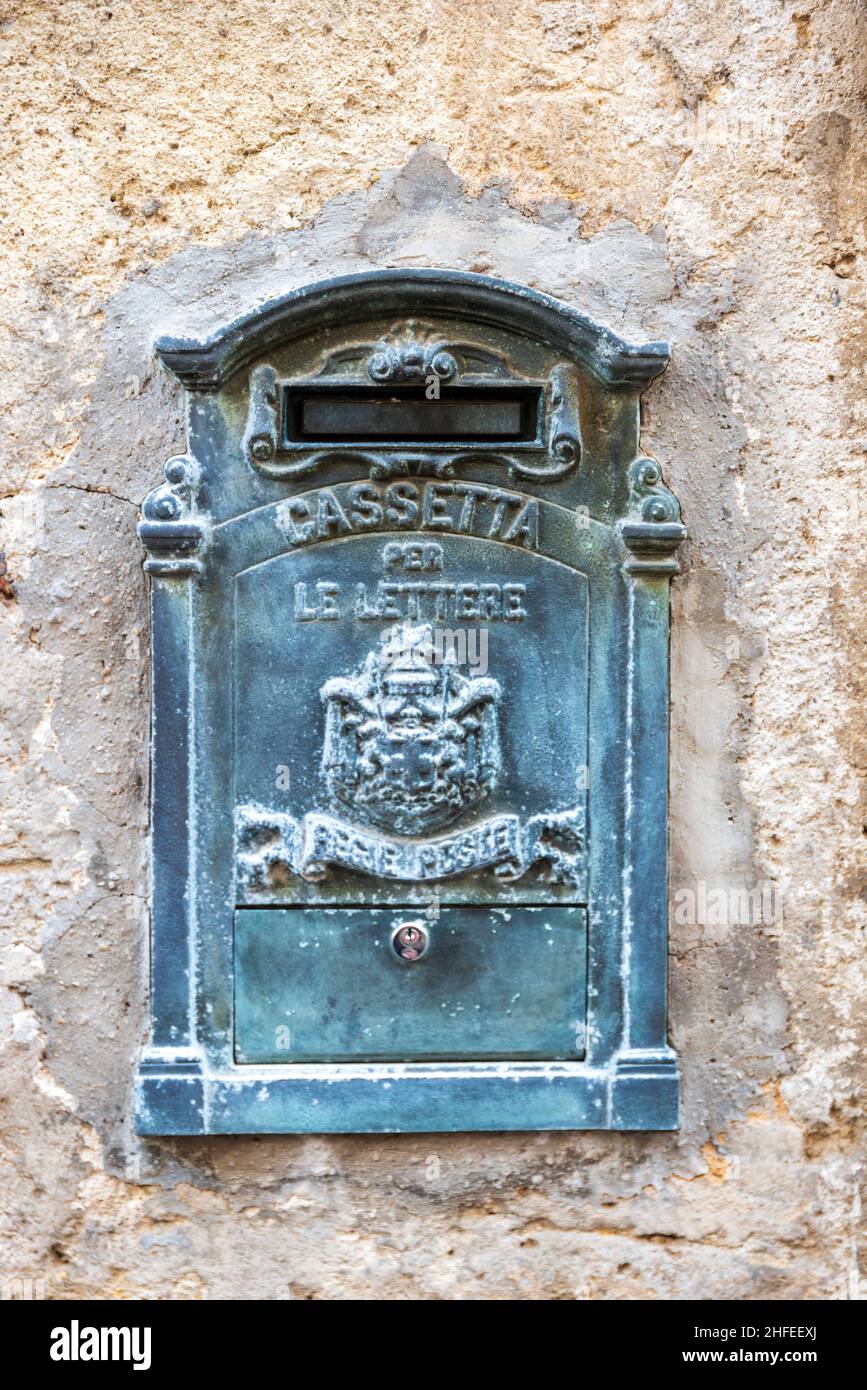 Traditional metal Italian wall-mounted letter box Stock Photo - Alamy