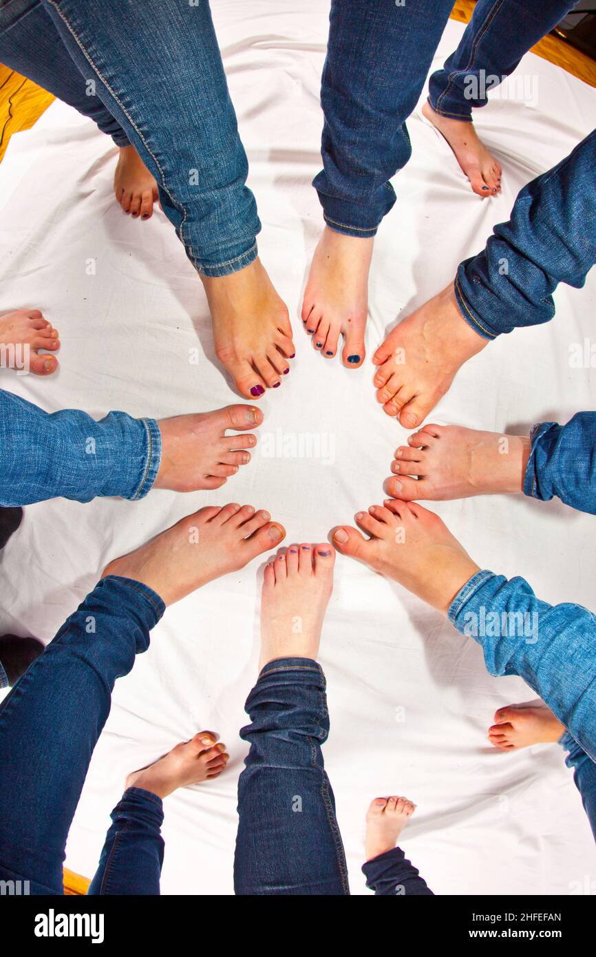 Feet together in circle hi-res stock photography and images - Alamy