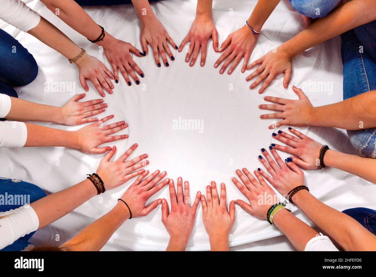hands of girls form a circle Stock Photo - Alamy
